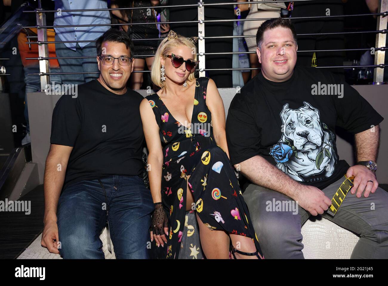 MIAMI BEACH, FL - JUNE 5: Naveen Jain, Paris Hilton and Riccardo Spagni are seen during Y.AT ...