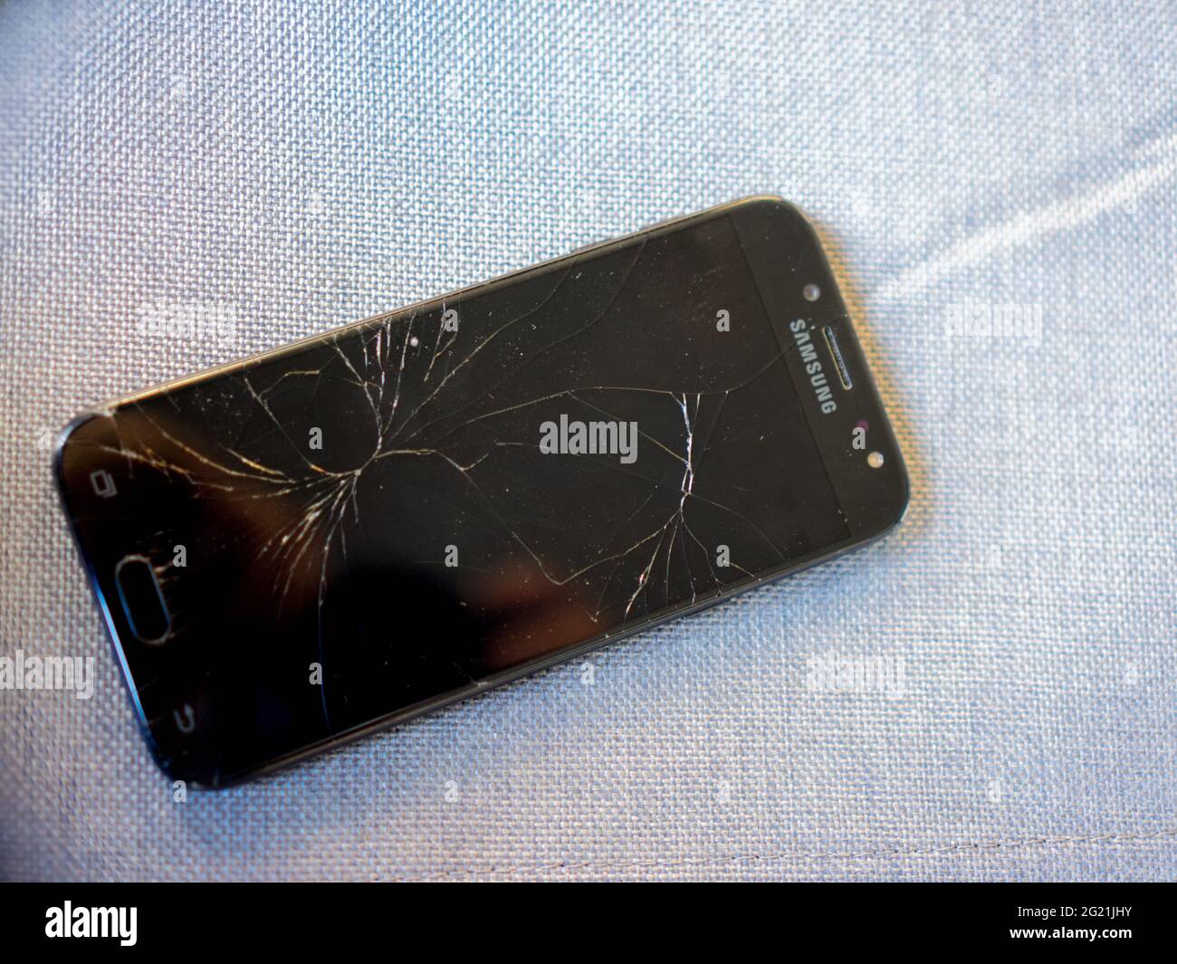 MIL, ITALY - Jun 01, 2021: Samsung smart phone with damaged glass ...