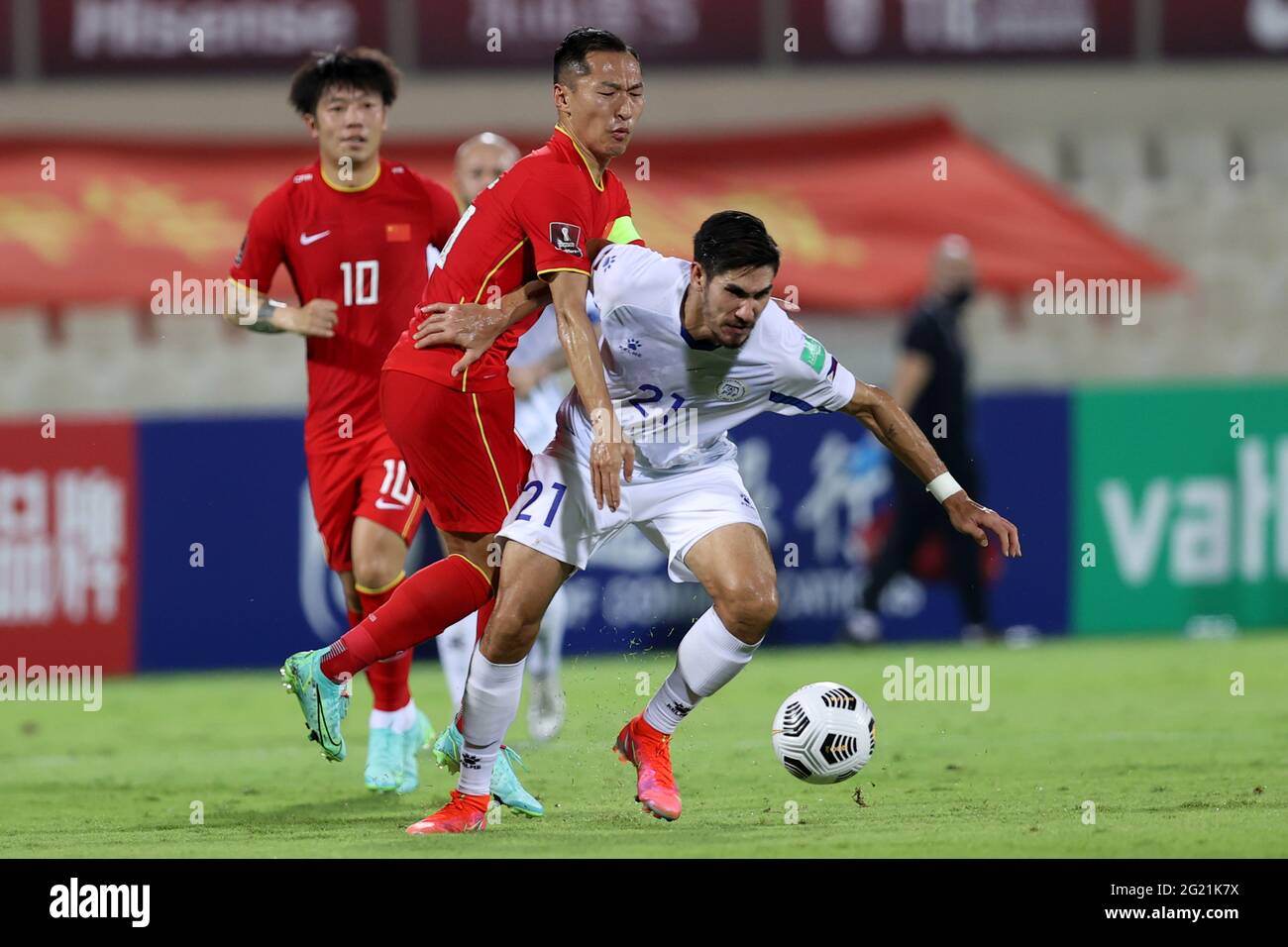 Sharjah. 8th June, 2021. Wu Xi (front L) of China vies with Mark ...