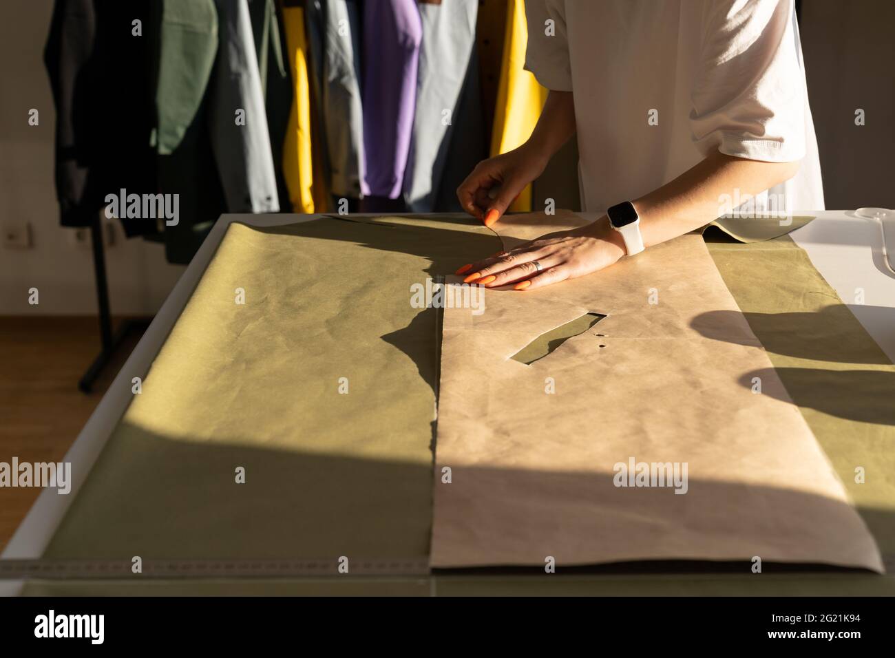 Clothes collection tailoring: dressmaker draft pattern on textile ...