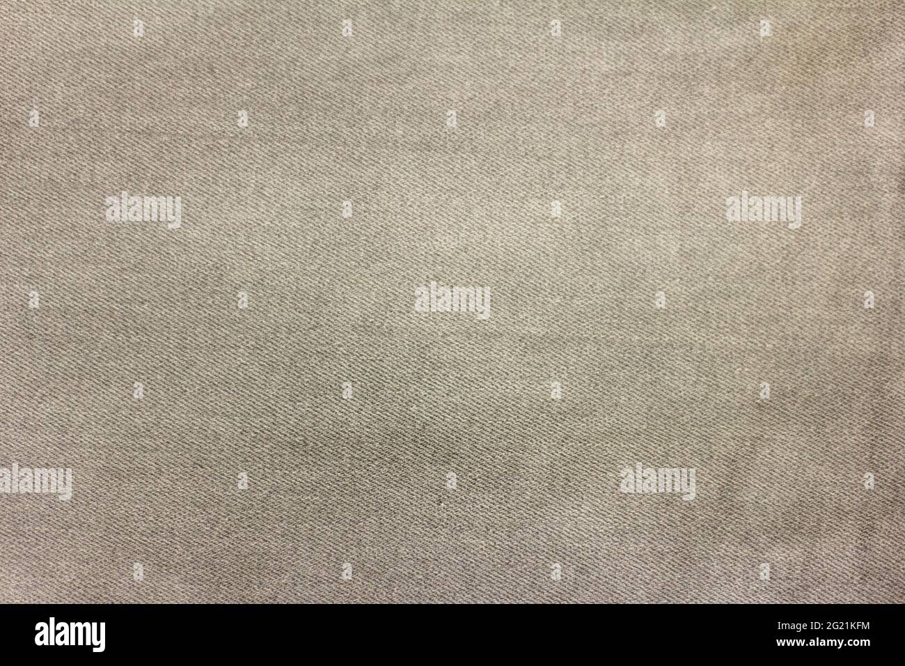 Grey denim background.Grey denim as a close-up background.Selective ...