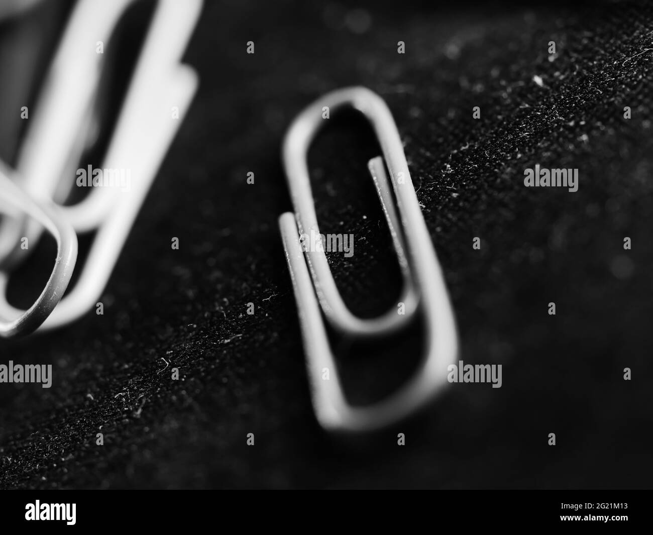 Paper clip on the table Stock Photo - Alamy
