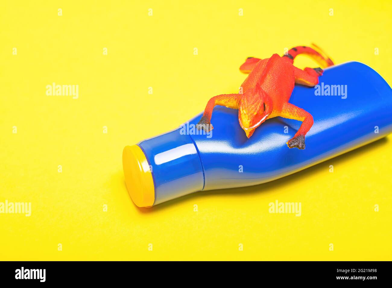 Red skin and sunscreen bottle. The concept of protecting and caring for ...