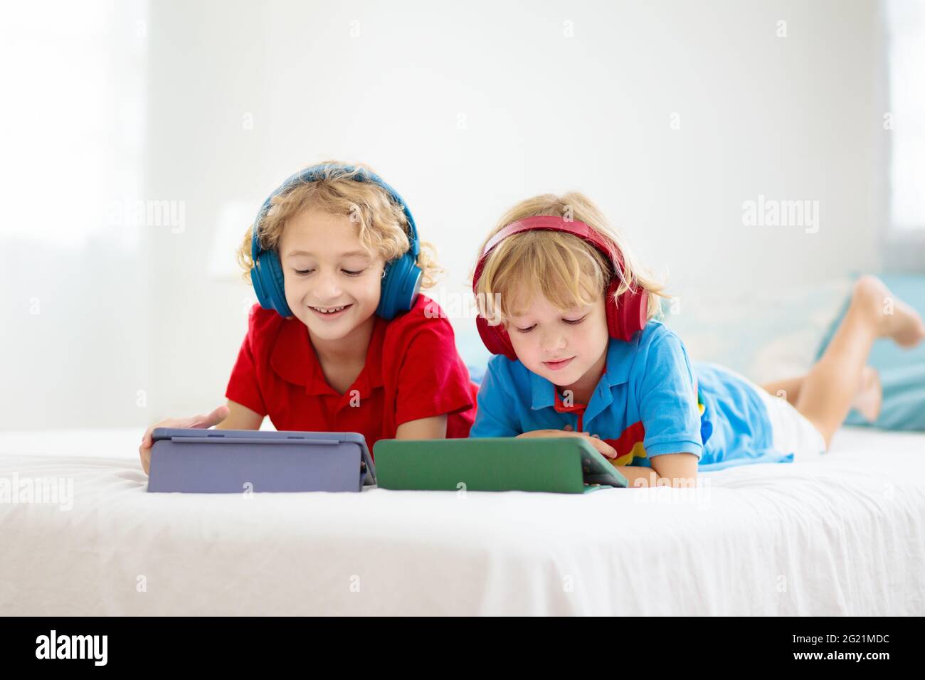 Child with tablet computer. Kids study online. Electronic device for ...