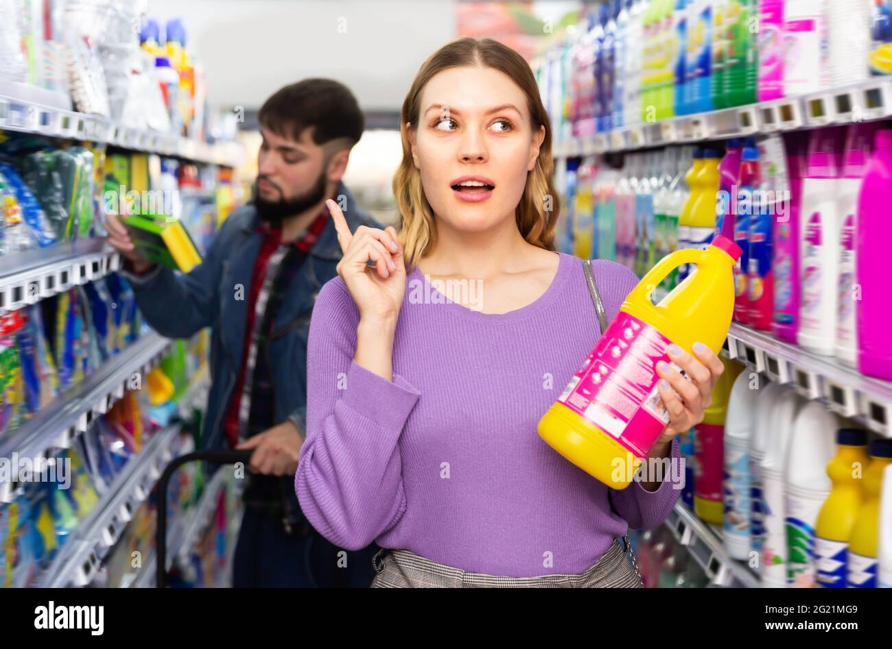 Focused people making purchases in store Stock Photo - Alamy