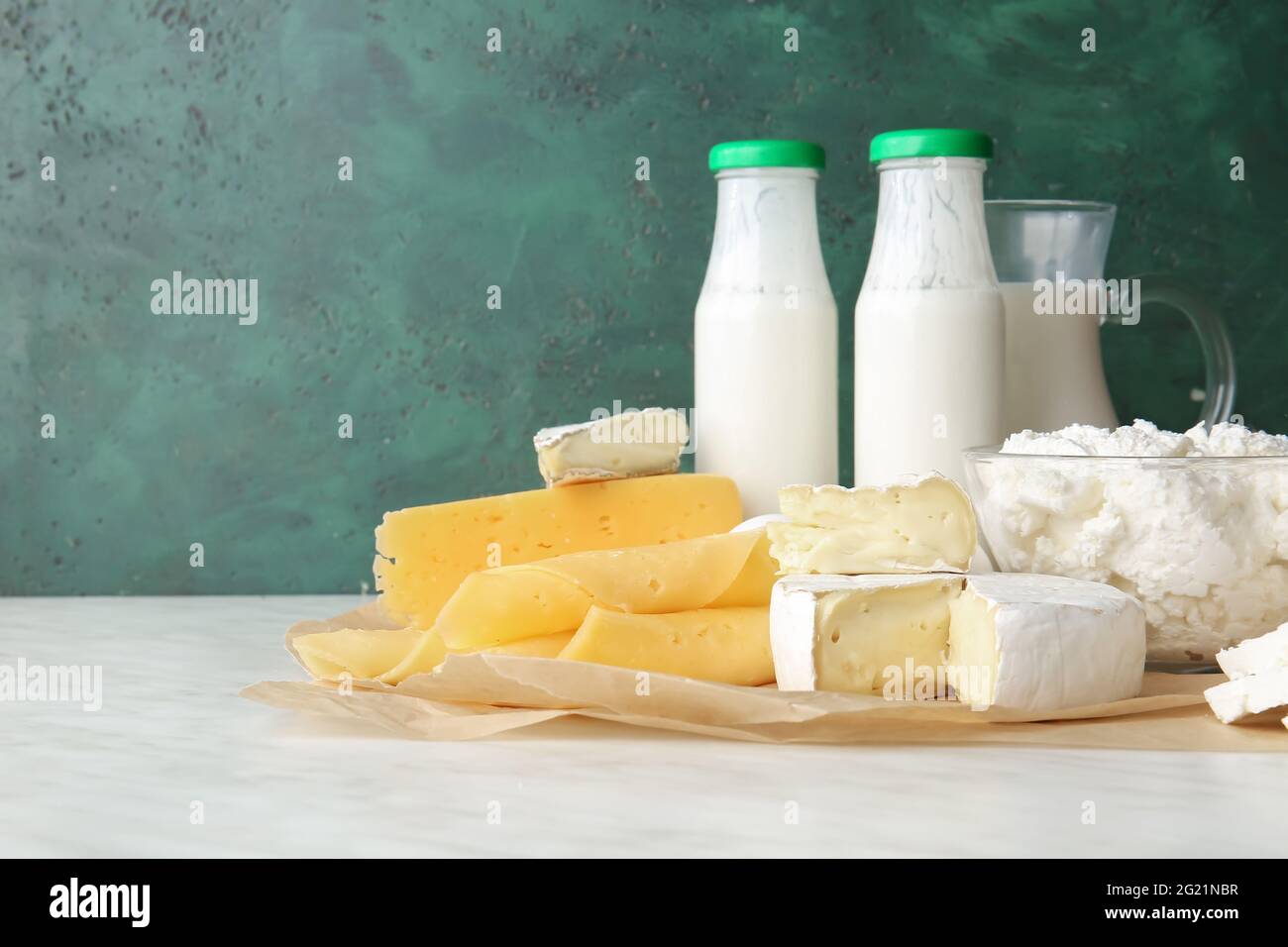 Different dairy products on color background Stock Photo - Alamy