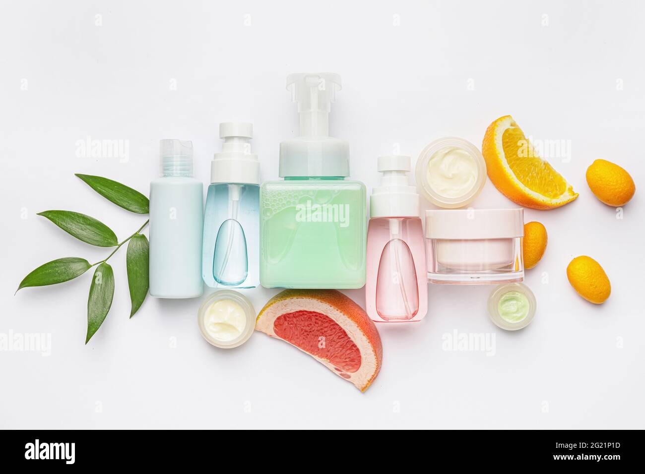 Natural cosmetic products with citrus fruits on white background Stock ...
