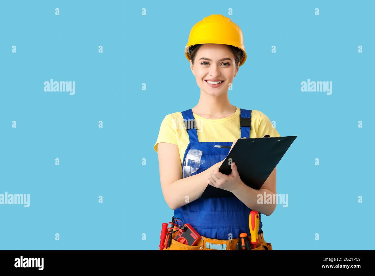 Woman builder writing on hi-res stock photography and images - Alamy