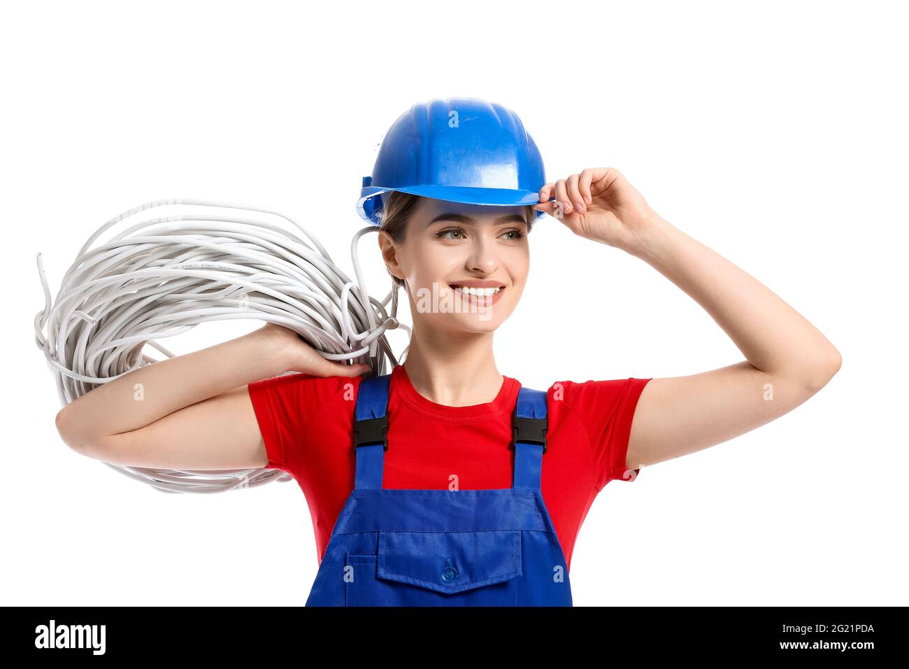 Young female electrician with cables on white background Stock Photo ...