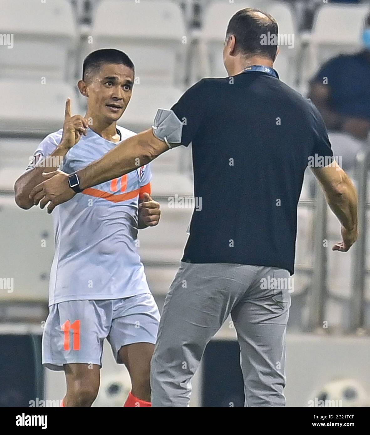 Doha, Qatar. 7th June, 2021. Sunil Chhetri (L) of India celebrates with ...