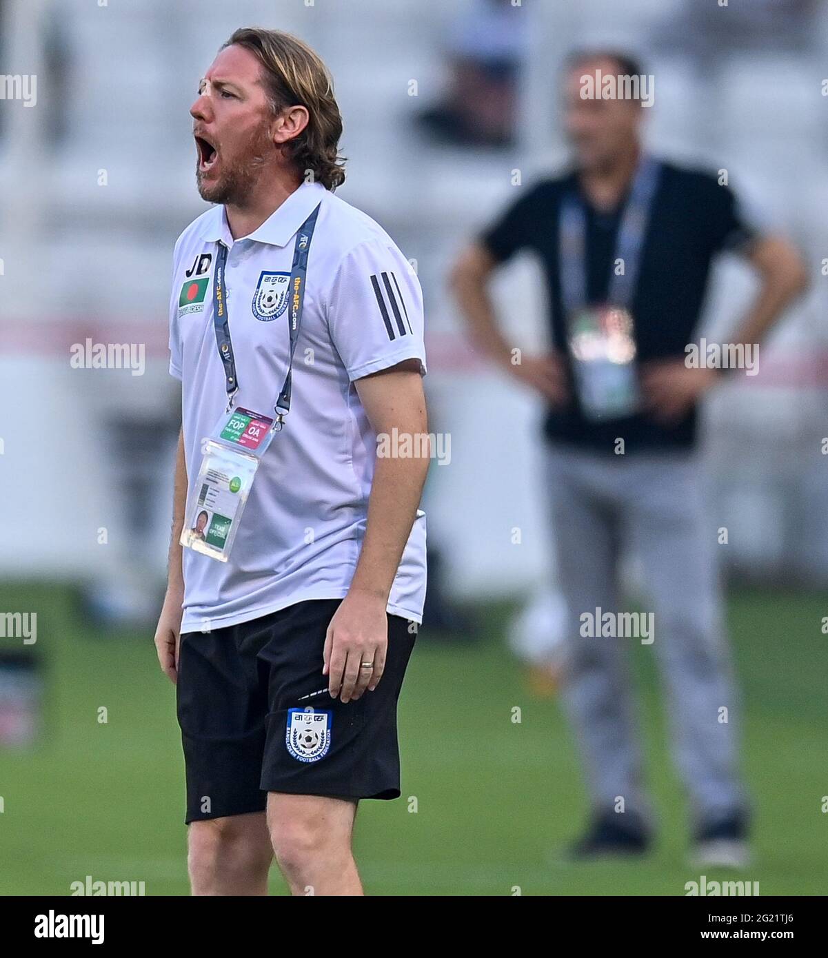 Doha, Qatar. 7th June, 2021. Bangladesh's head coach Jamie Day reacts ...