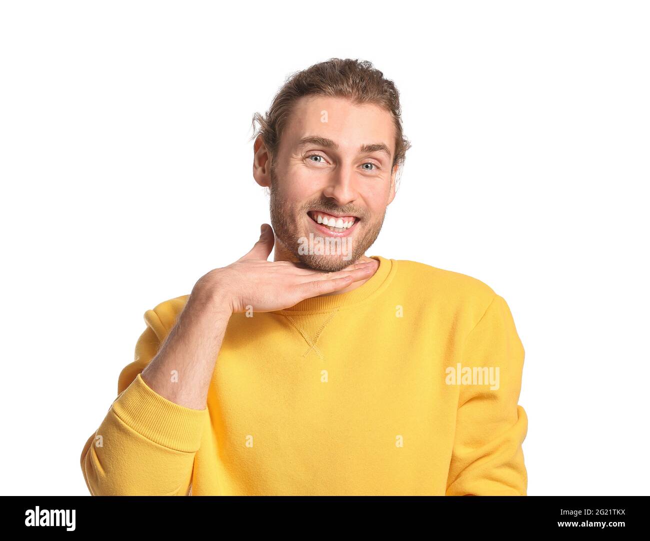 Smiling young man on white background Stock Photo - Alamy