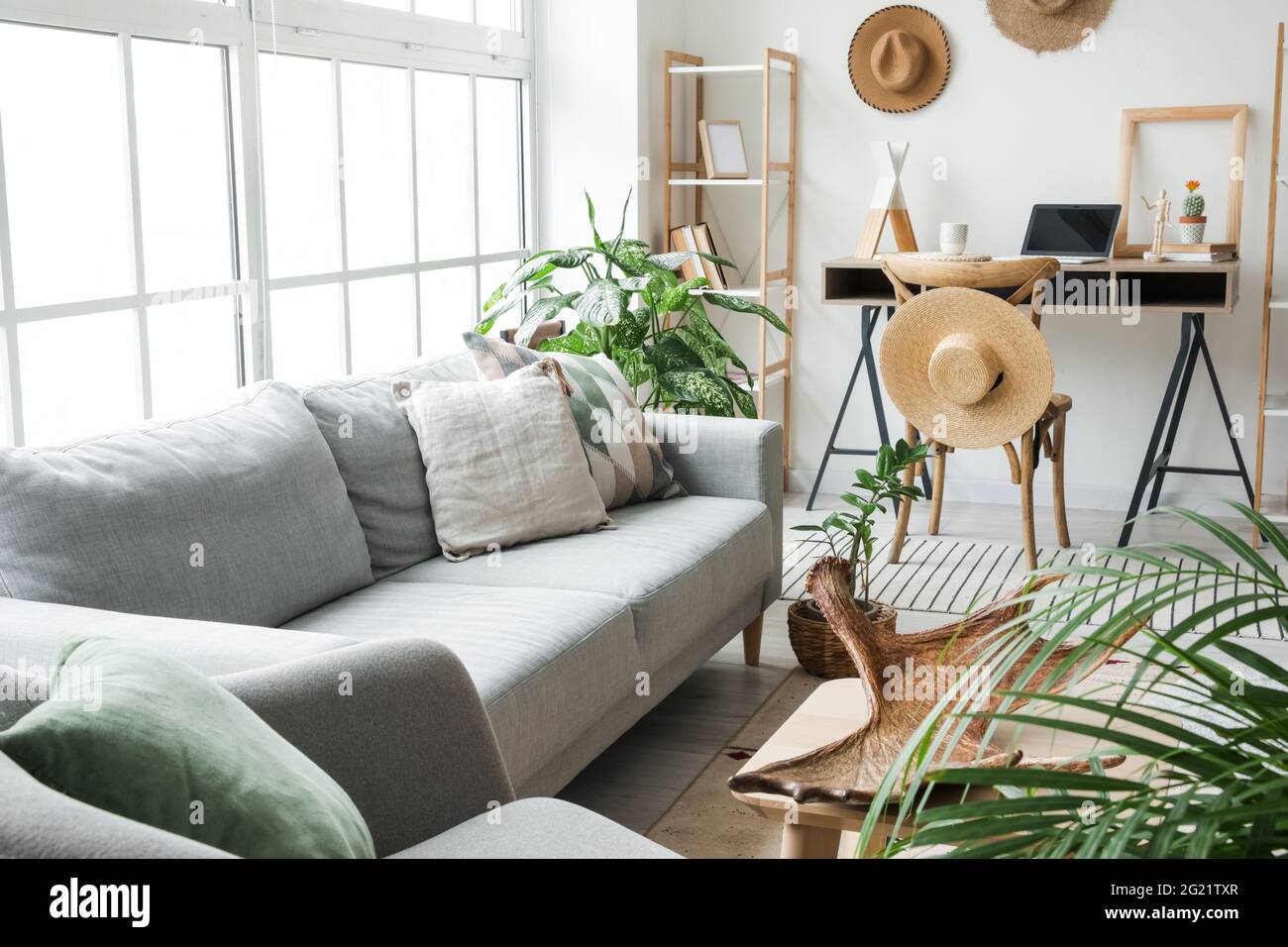 Stylish workplace in interior of room Stock Photo - Alamy