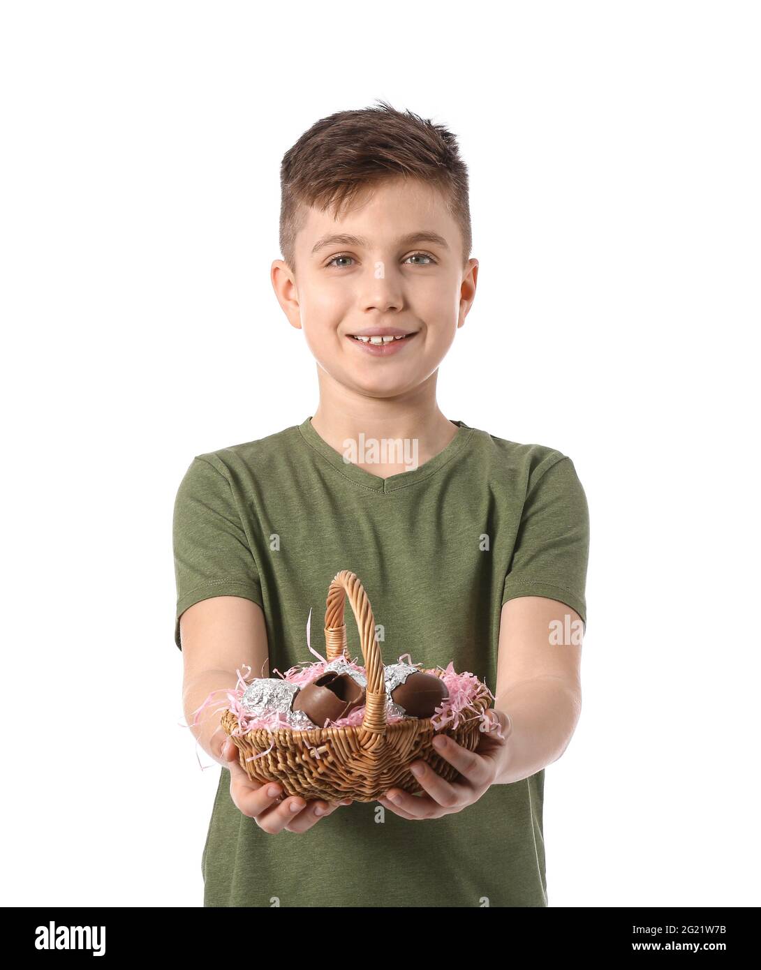 Cute little boy with basket of chocolate Easter eggs on white ...