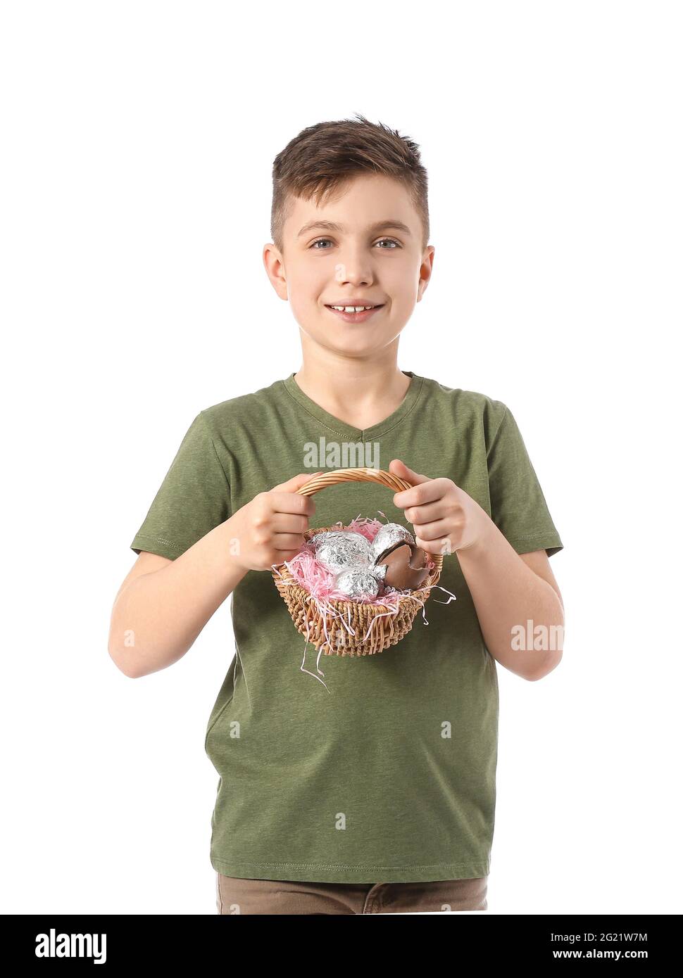 Cute little boy with basket of chocolate Easter eggs on white ...
