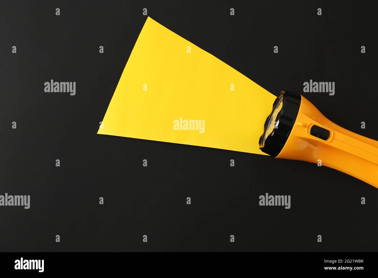Creative composition with modern flashlight on dark background Stock ...