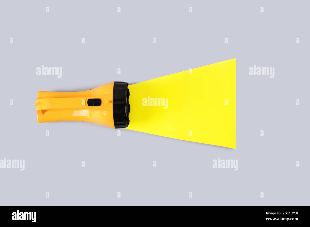 Creative composition with modern flashlight on light background Stock ...