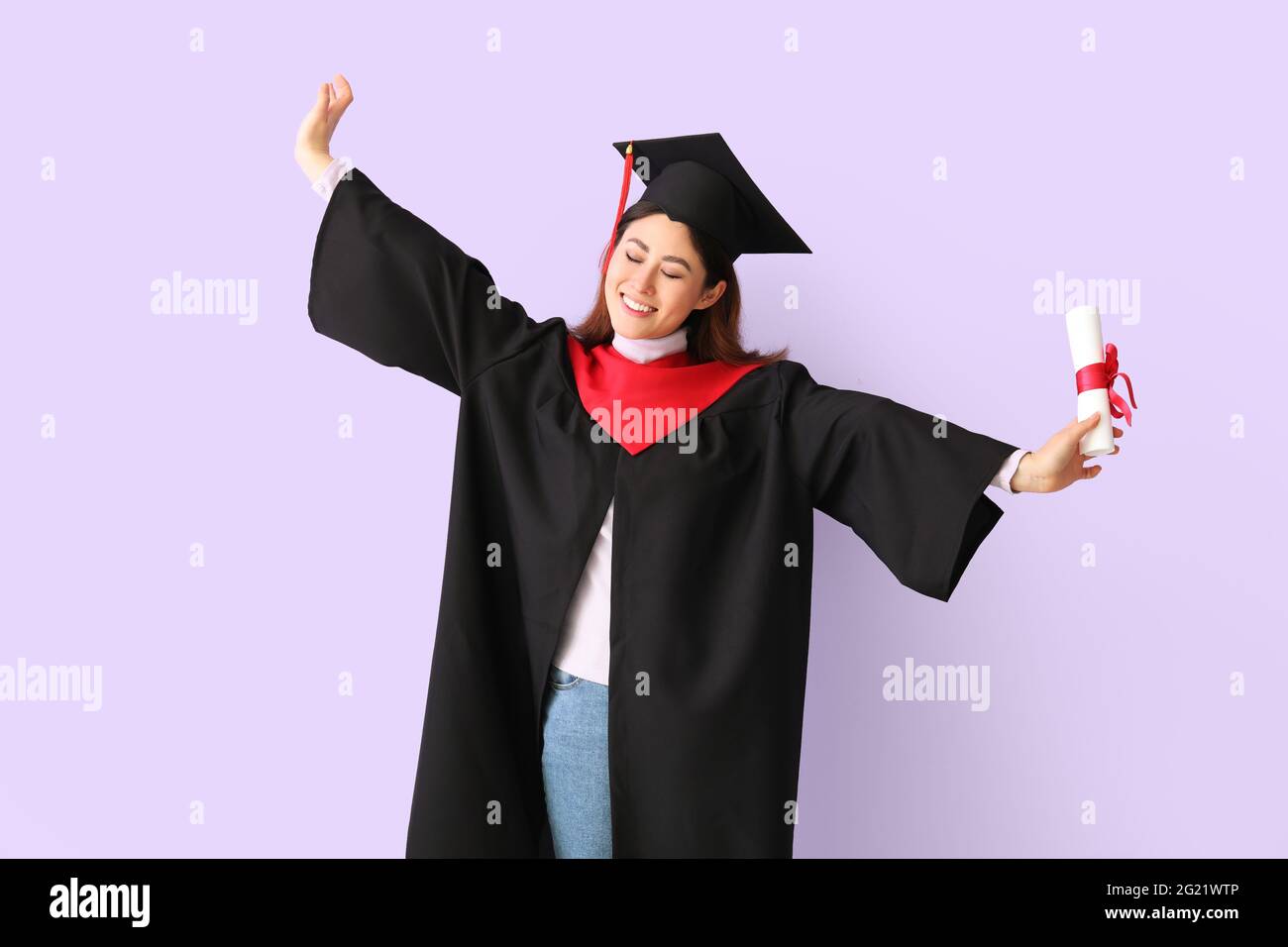 Happy female graduating student with diploma on color background Stock ...