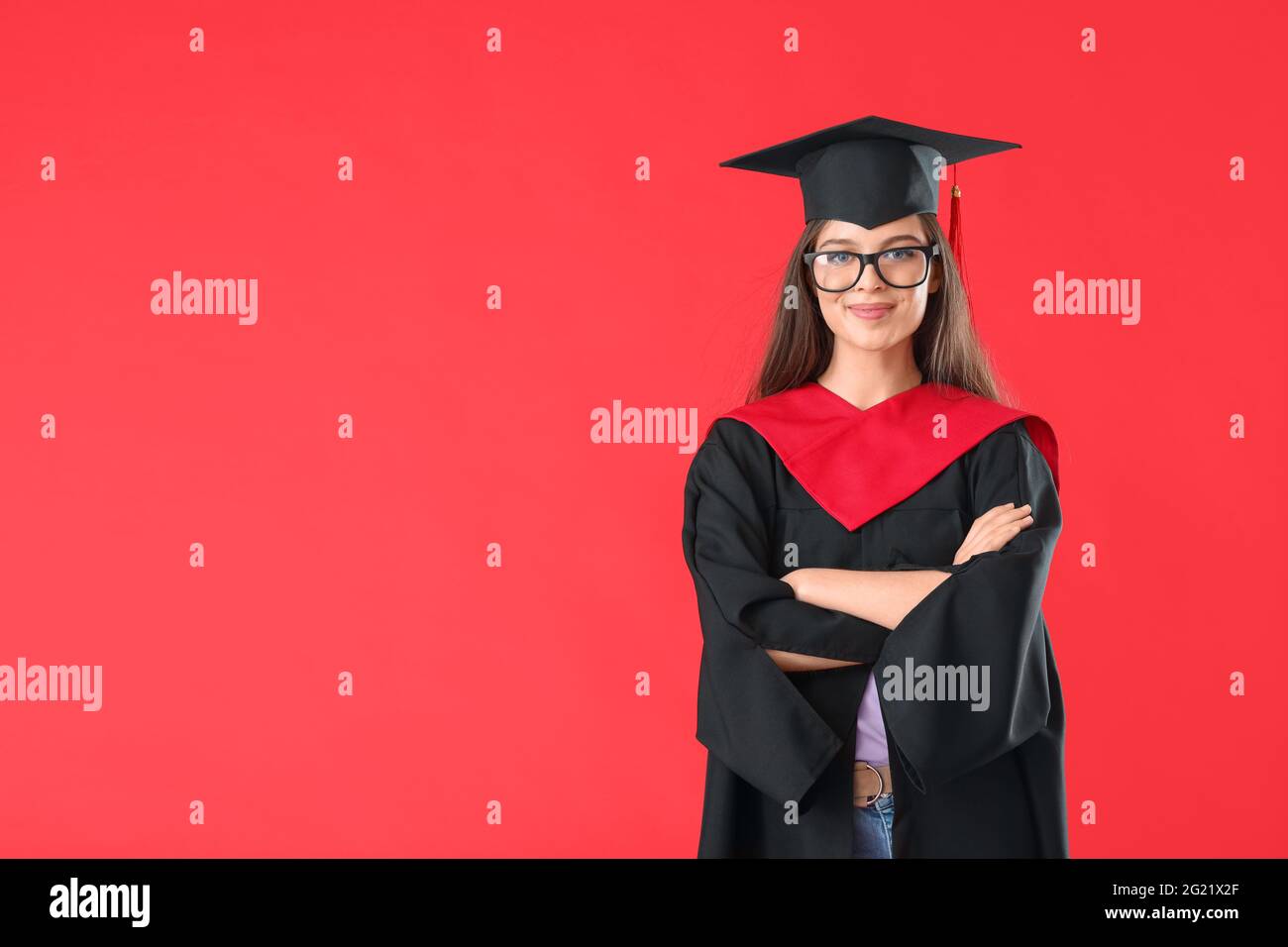 Female graduating student on color background Stock Photo - Alamy