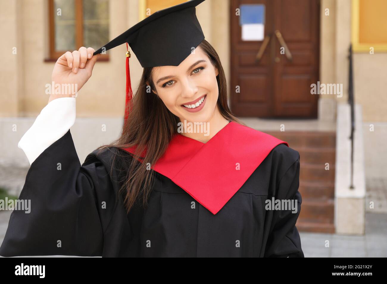 Female student in bachelor robe on her graduation day Stock Photo - Alamy