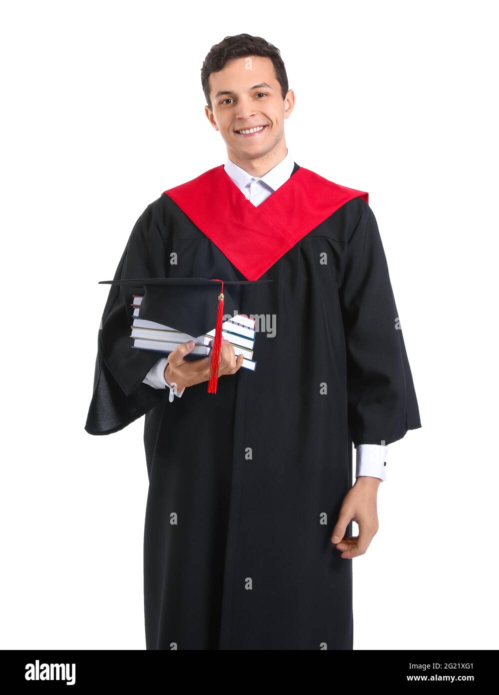 Male graduating student with books on white background Stock Photo - Alamy