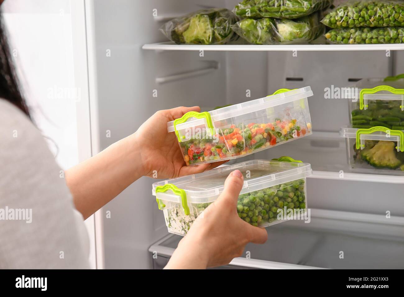 Putting food in the refrigerator hi-res stock photography and images ...