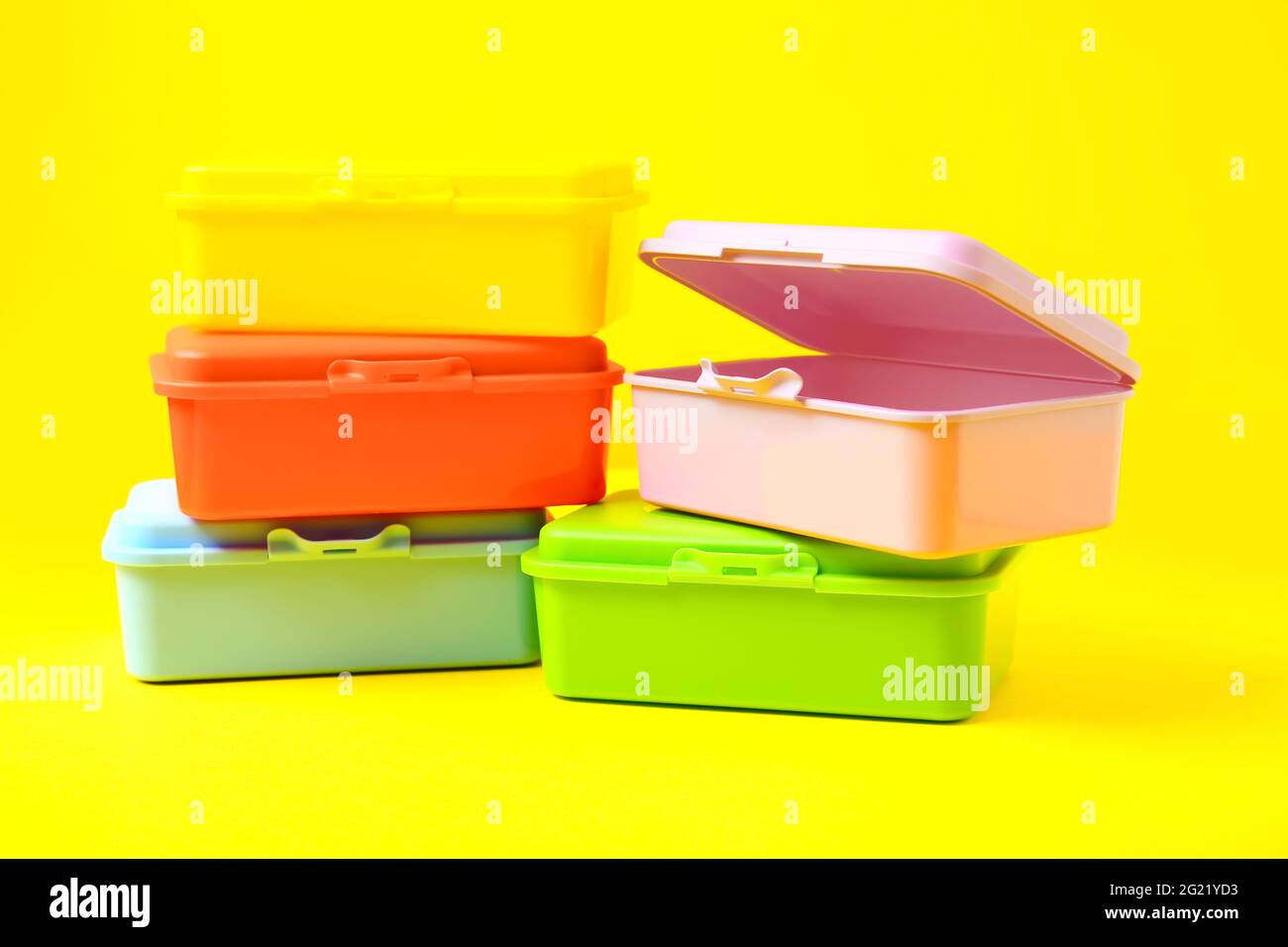 Plastic lunch boxes on color background Stock Photo - Alamy