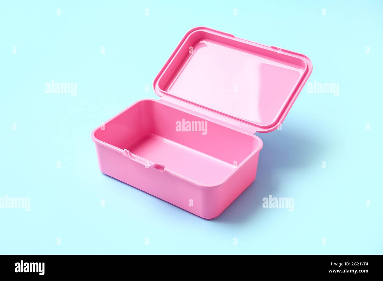 Plastic lunch box on color background Stock Photo - Alamy