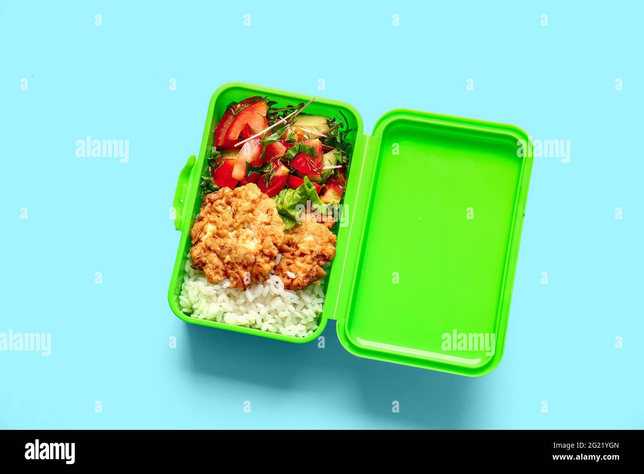 Lunch box with tasty food on color background Stock Photo - Alamy