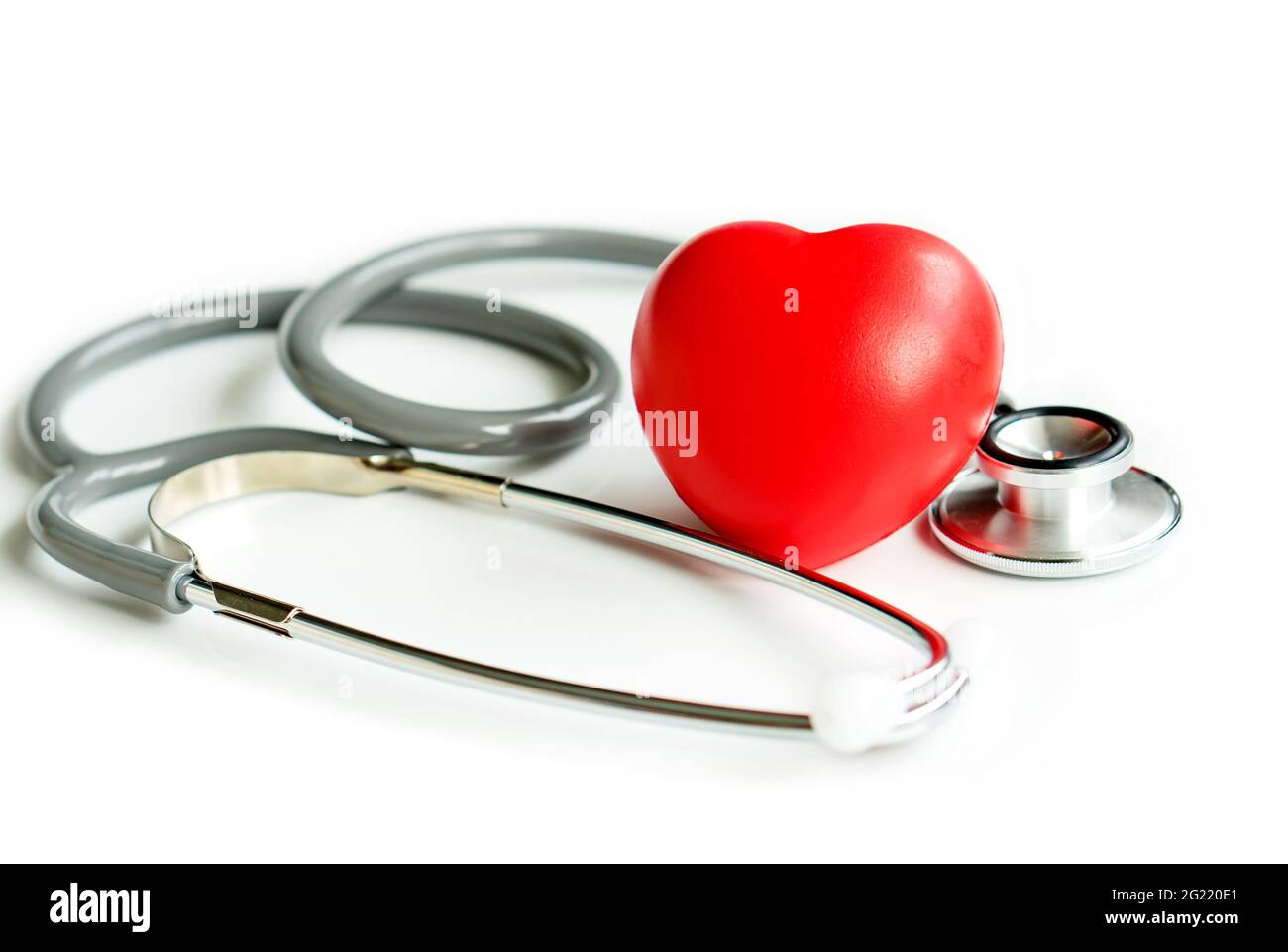 A heart with a stethoscope lying Stock Photo - Alamy