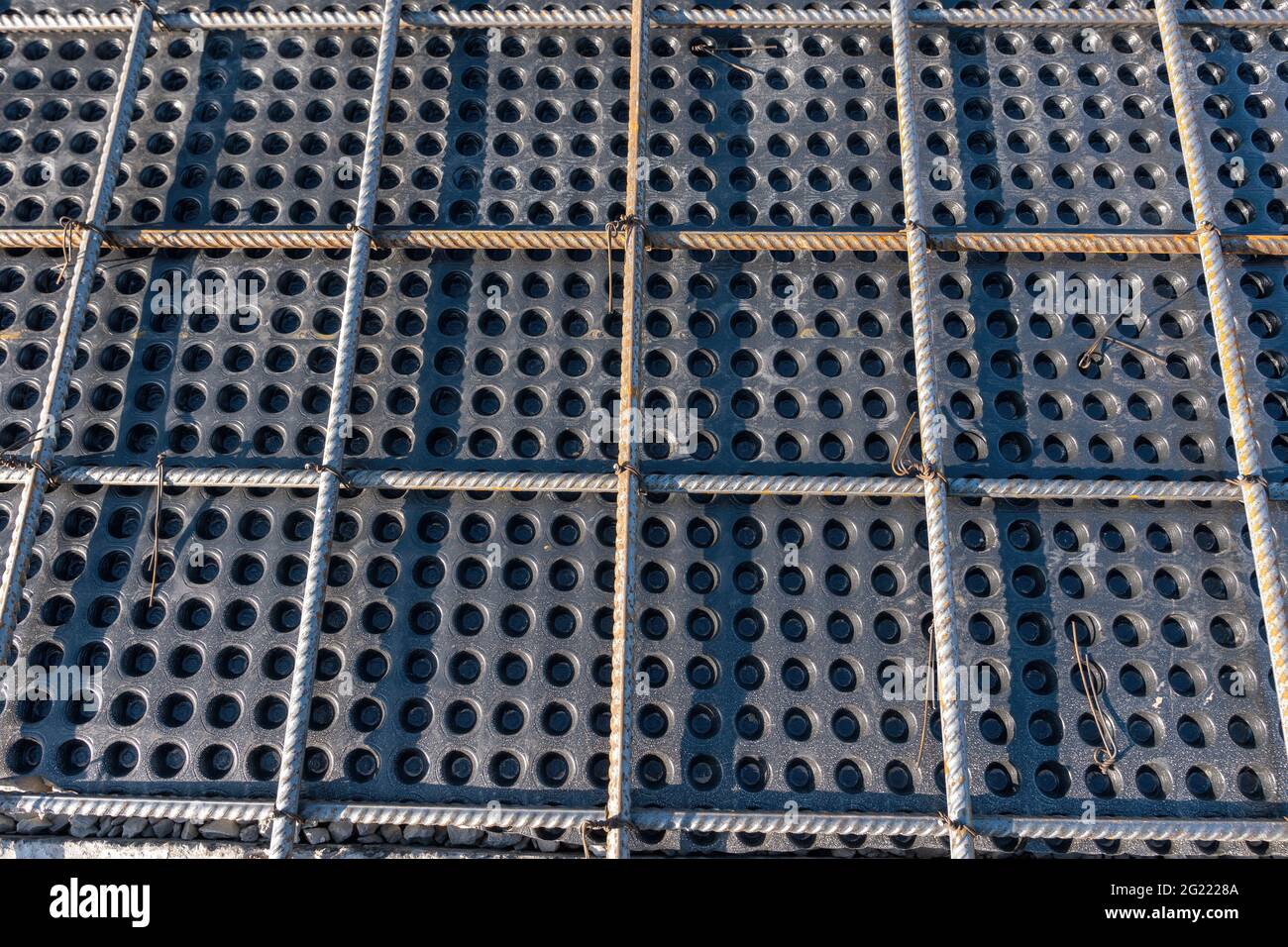Close up view of reinforcement of concrete. Geometric alignment of ...