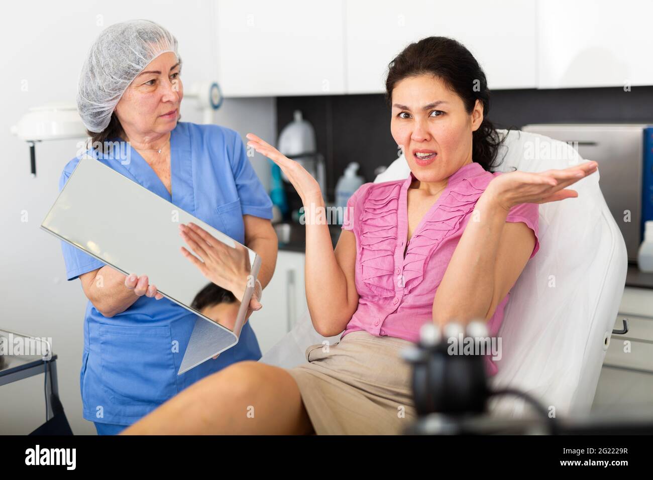 Female patient unhappy with results of cosmetic procedures in aesthetic ...