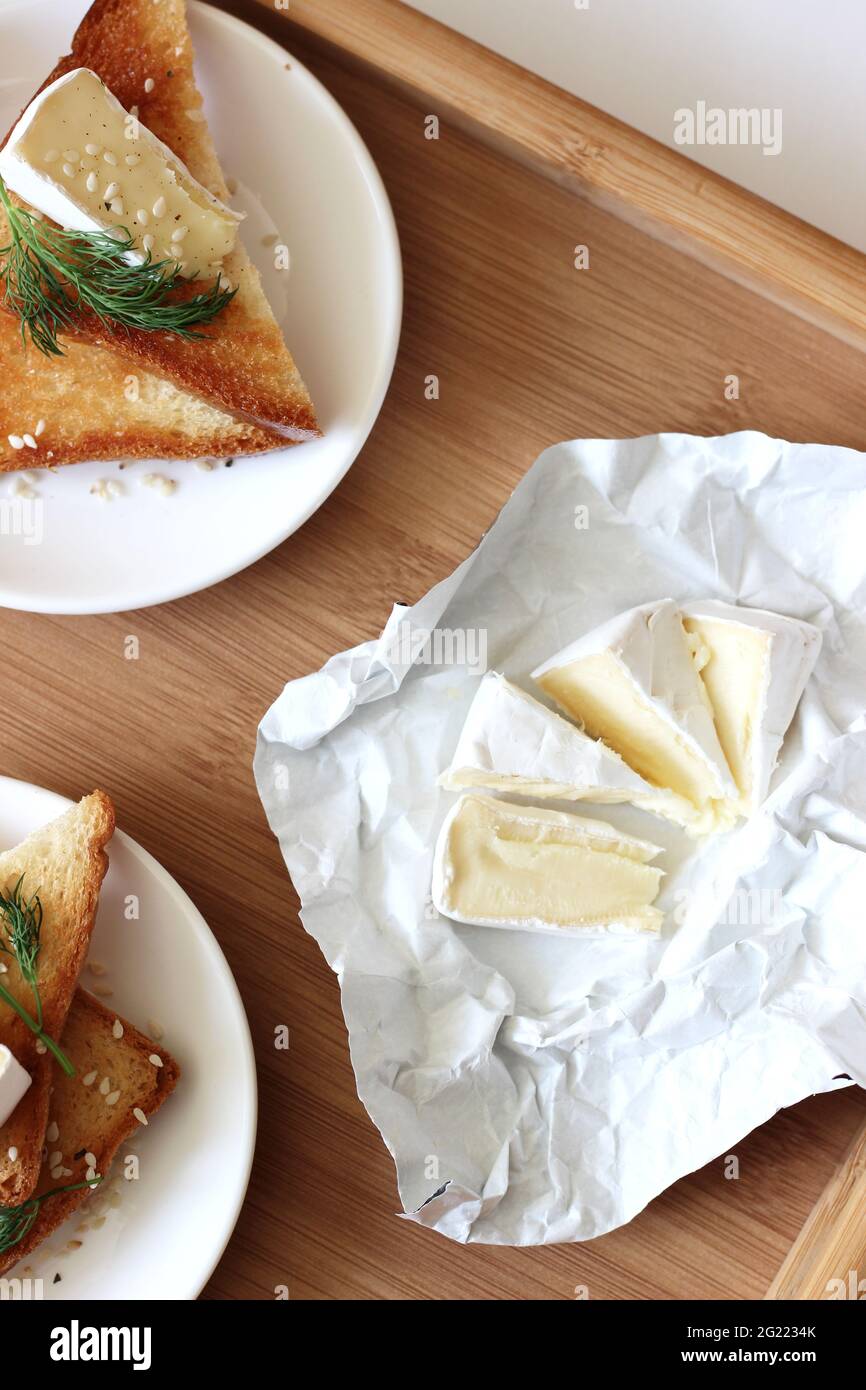 Camembert Cheese with Fried Toasts. Traditional Breakfast Stock Photo ...