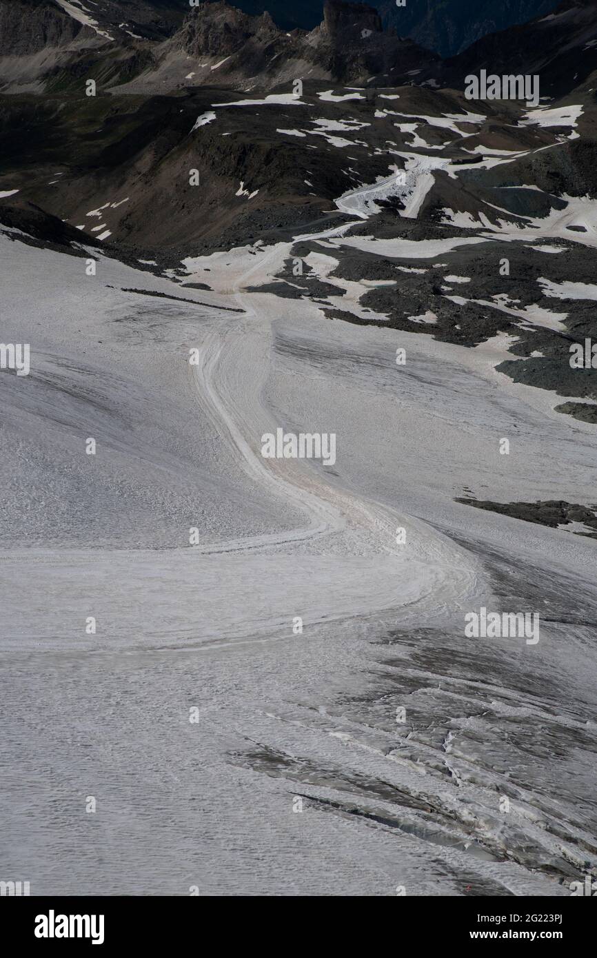 Skiing slope on a snowy mountain Stock Photo - Alamy
