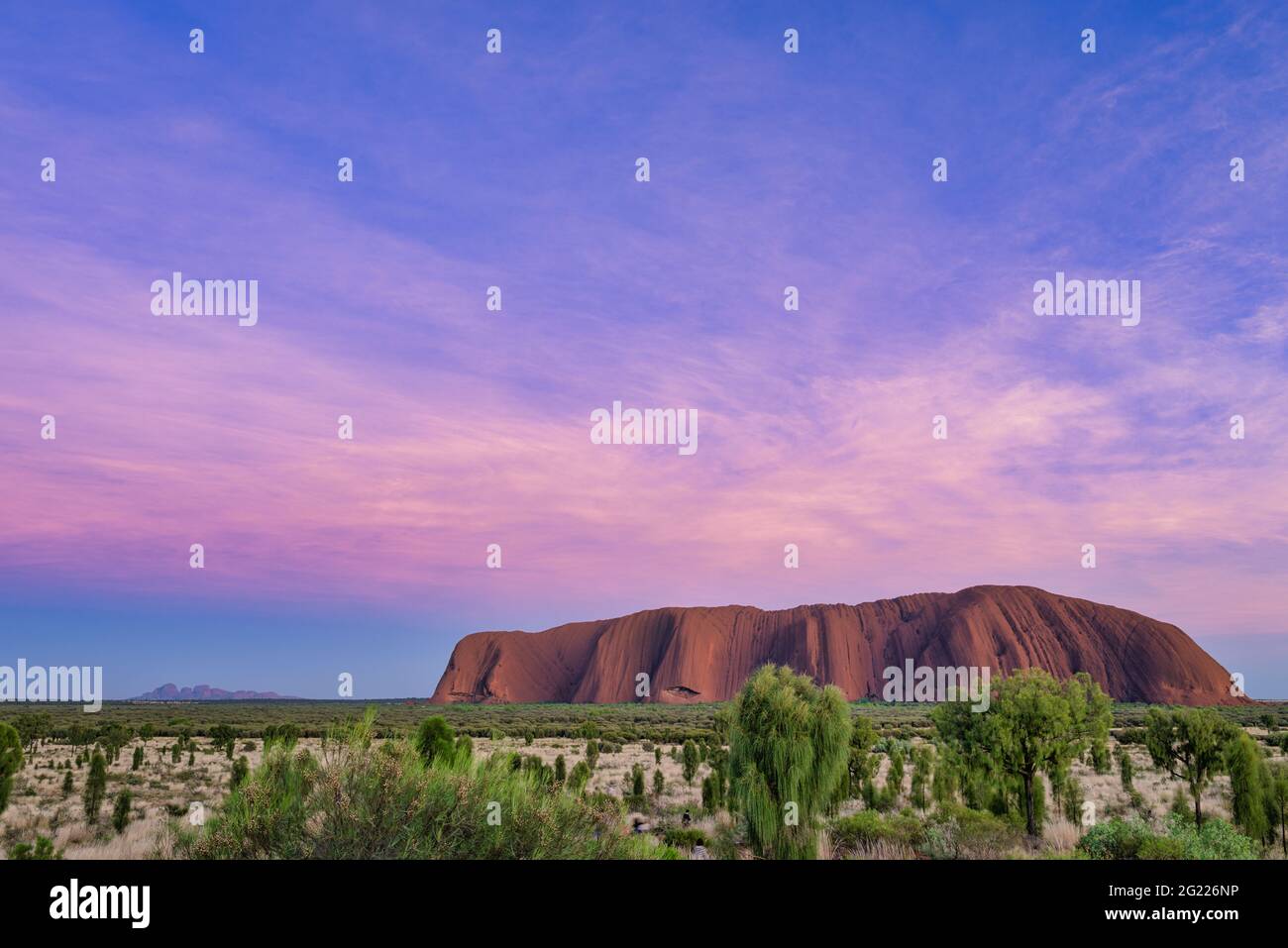 Spectacular sunrise, Uluru and Kata Tjuta framed by a vibrant sunrise ...