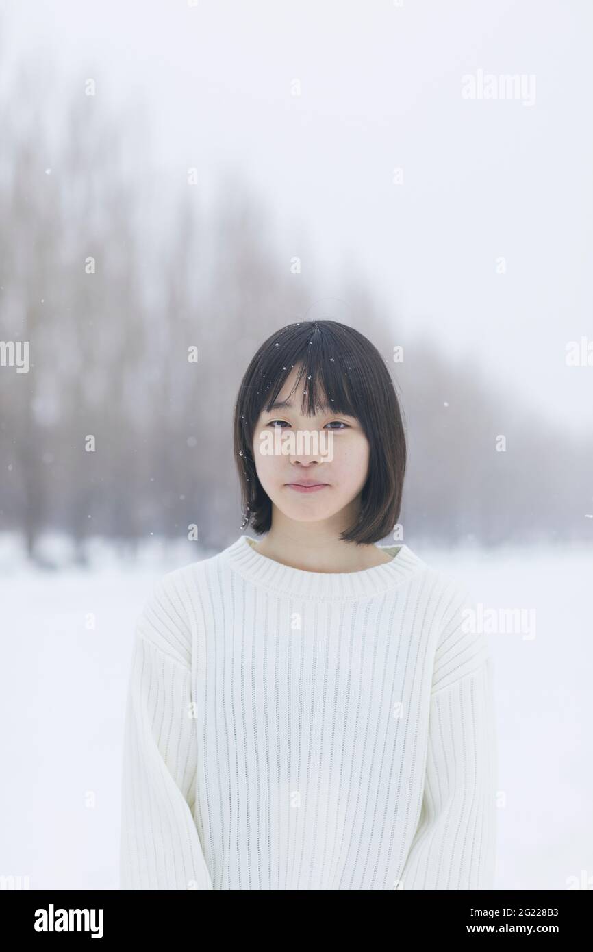 Young Japanese girl in the snow Stock Photo - Alamy