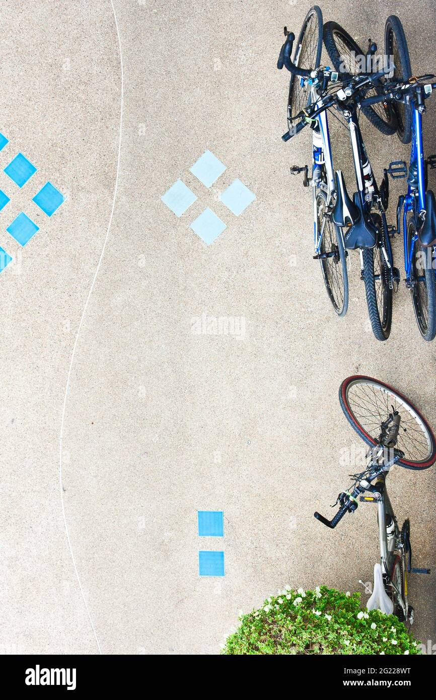 Bird eye view of bicycles parked on the ground Stock Photo - Alamy