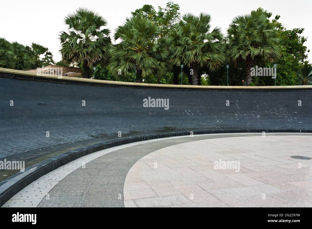 Curve seats in the park,perspective view Stock Photo - Alamy
