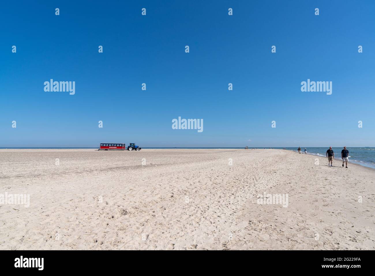 Skagen, Denmark - 4 June, 2021:tractor trailer bringing tourists to the ...