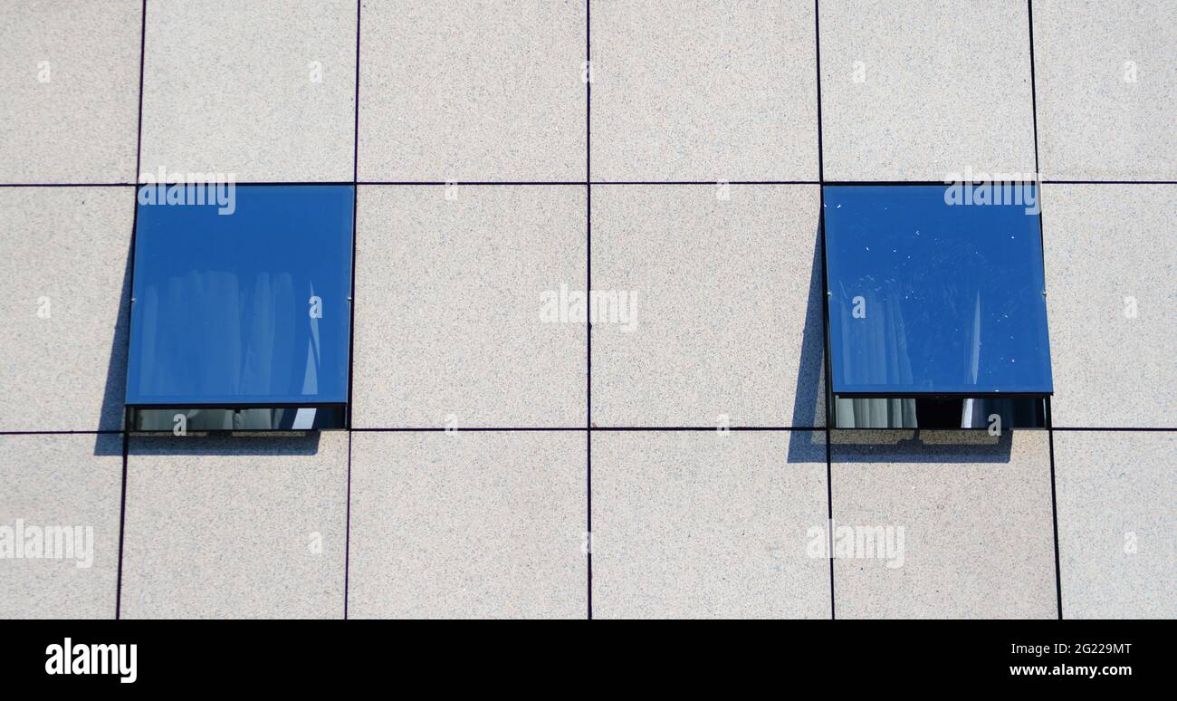 two open windows on a moder facade building Stock Photo - Alamy