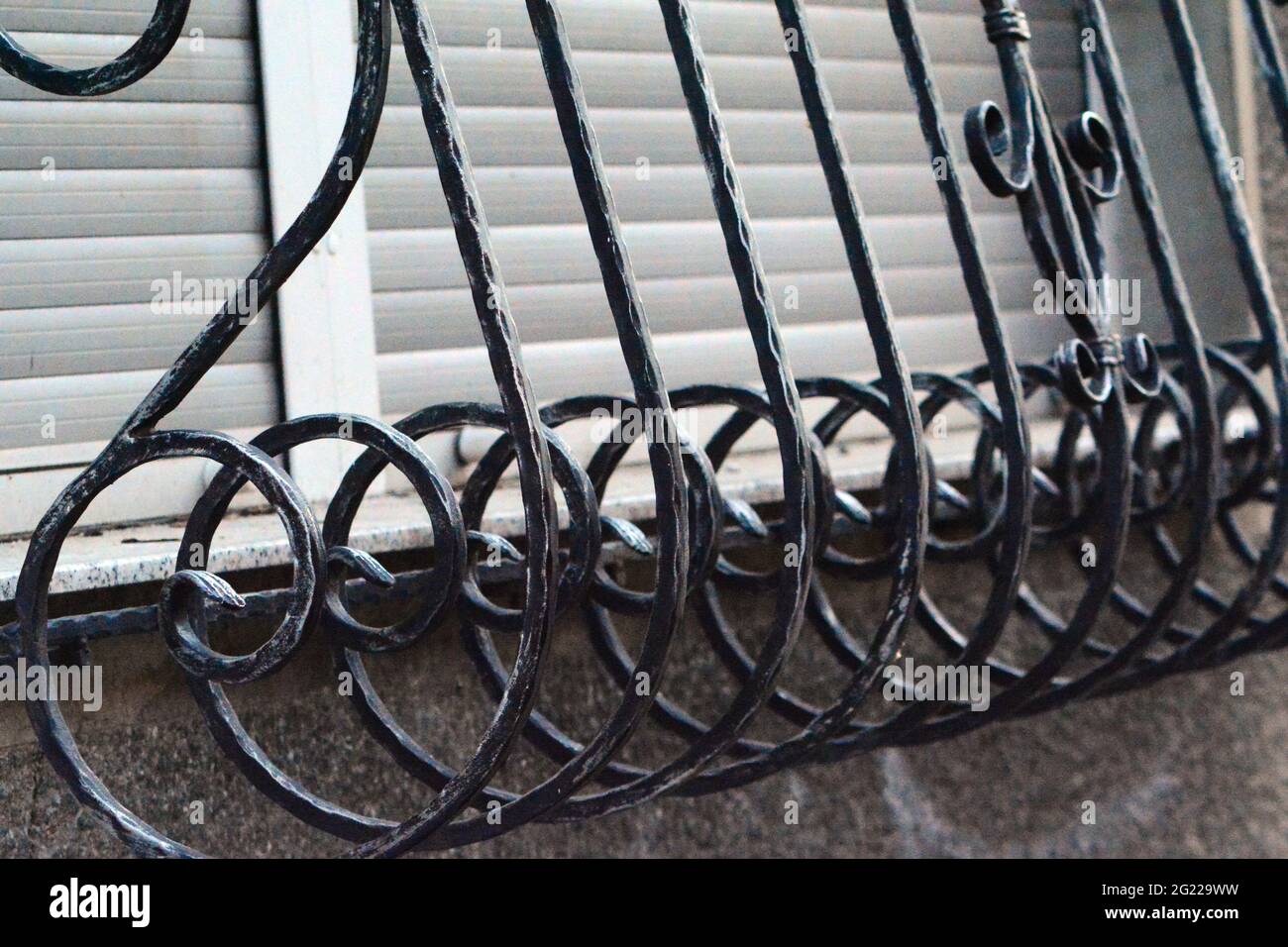 a wrought iron window fence Stock Photo - Alamy