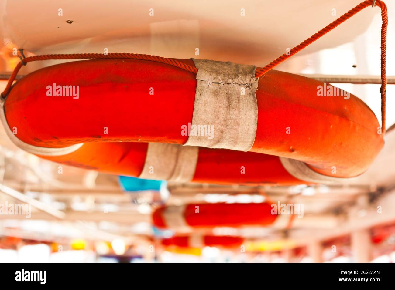 Lifebuoy hanging on the ceiling of the boat Stock Photo - Alamy