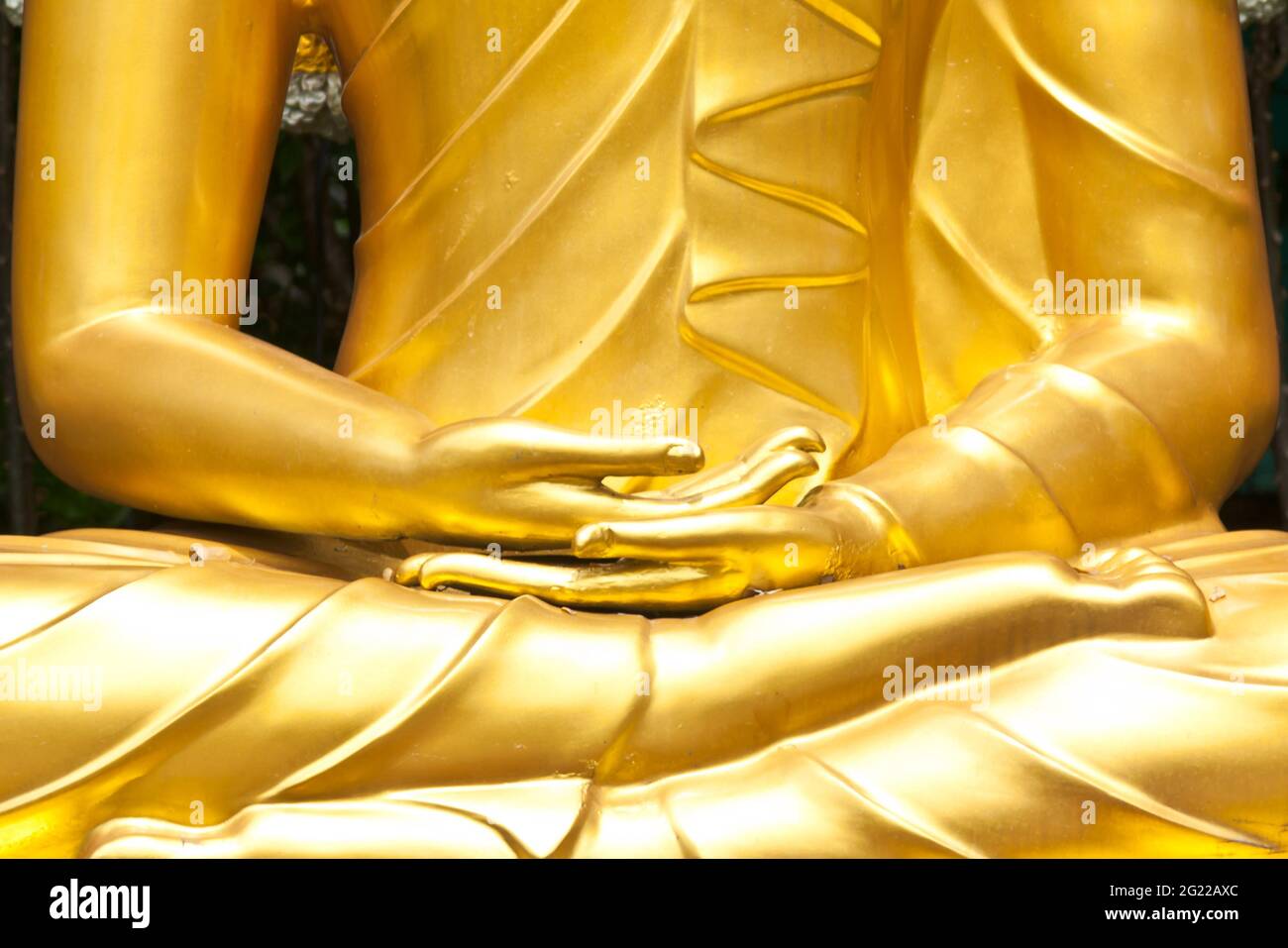 Close up of golden Buddhist statue hands Stock Photo - Alamy