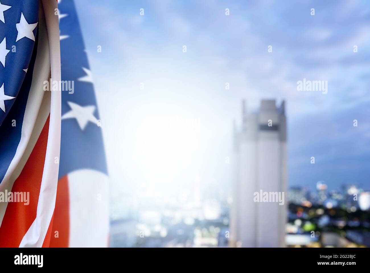 American flag waving in the air with a sky background. Fourth of July ...