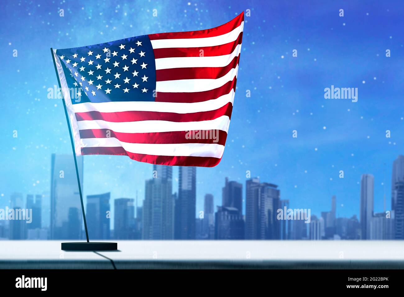 American flag waving in the air with night scene background. Fourth of ...
