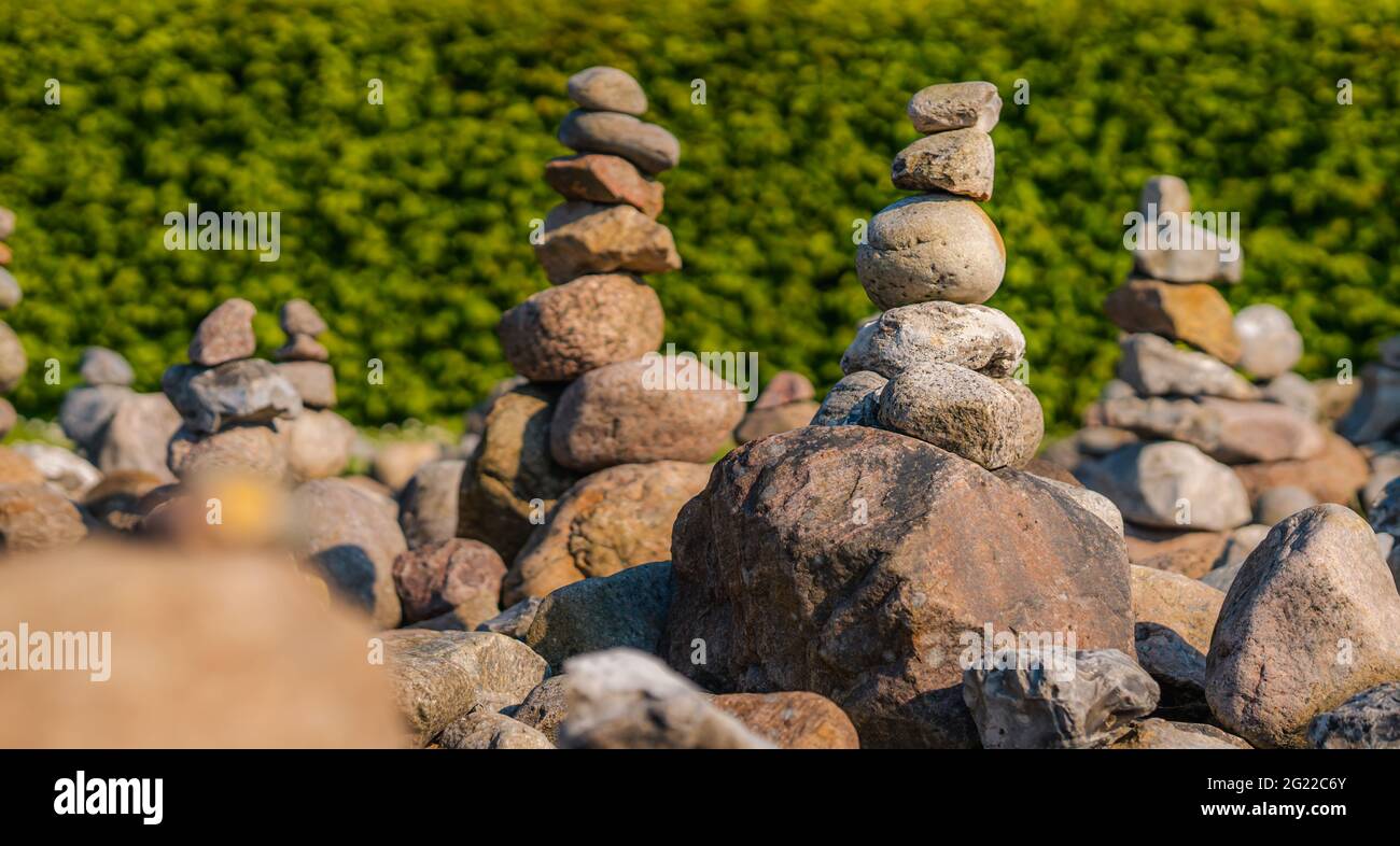 Many stacks of stones in balance Stock Photo - Alamy
