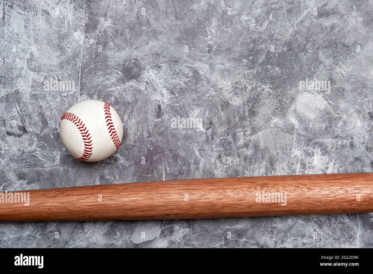 Baseball ball and bat on grey background. Team sport concept Stock ...
