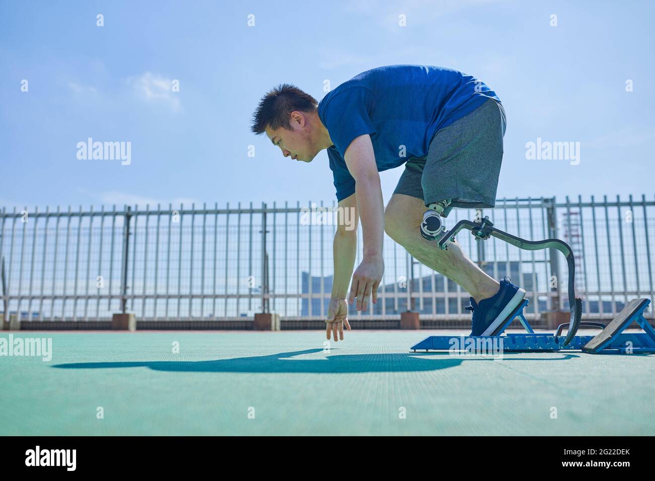 Japanese amputee athlete training on rooftop Stock Photo - Alamy