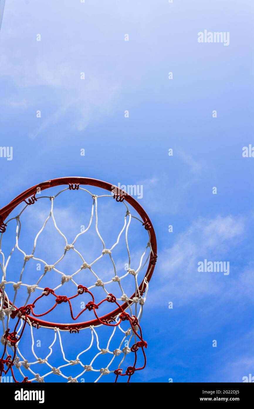 A view of a basketball hoop from below Stock Photo - Alamy
