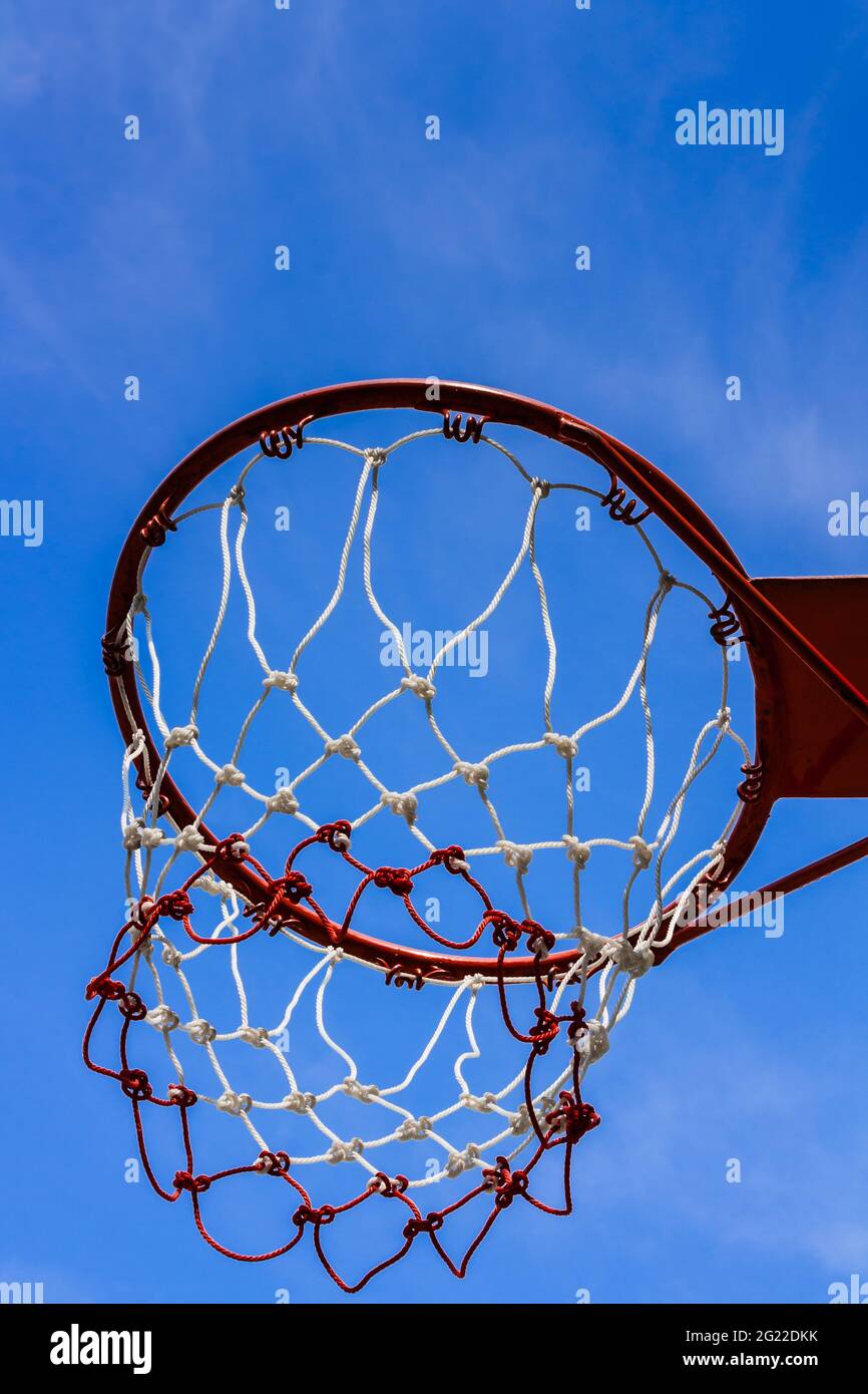 A view of a basketball hoop from below Stock Photo - Alamy